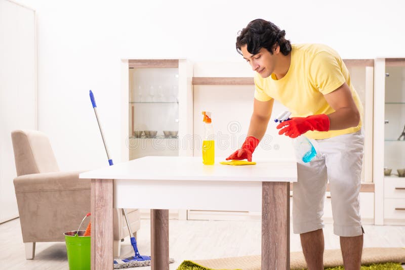 The Young Handsome Man Doing Housework Stock Image - Image of ...