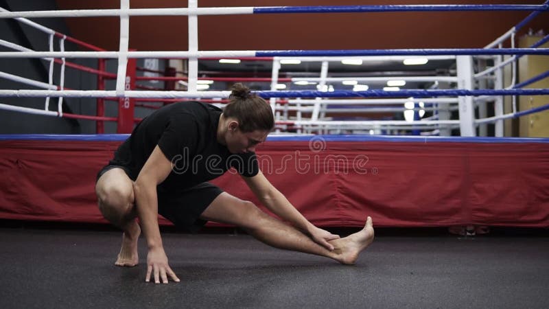 Young Handsome Man Engaged in Boxing Stretching and Preparing. Fighter ...