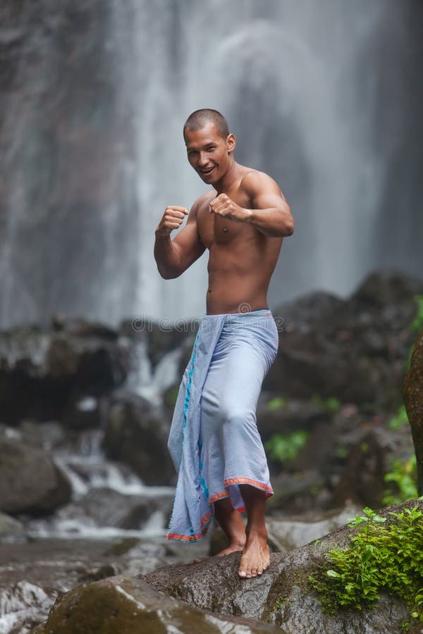 Man at waterfall stock image. Image of high, asian, meditate - 33323259