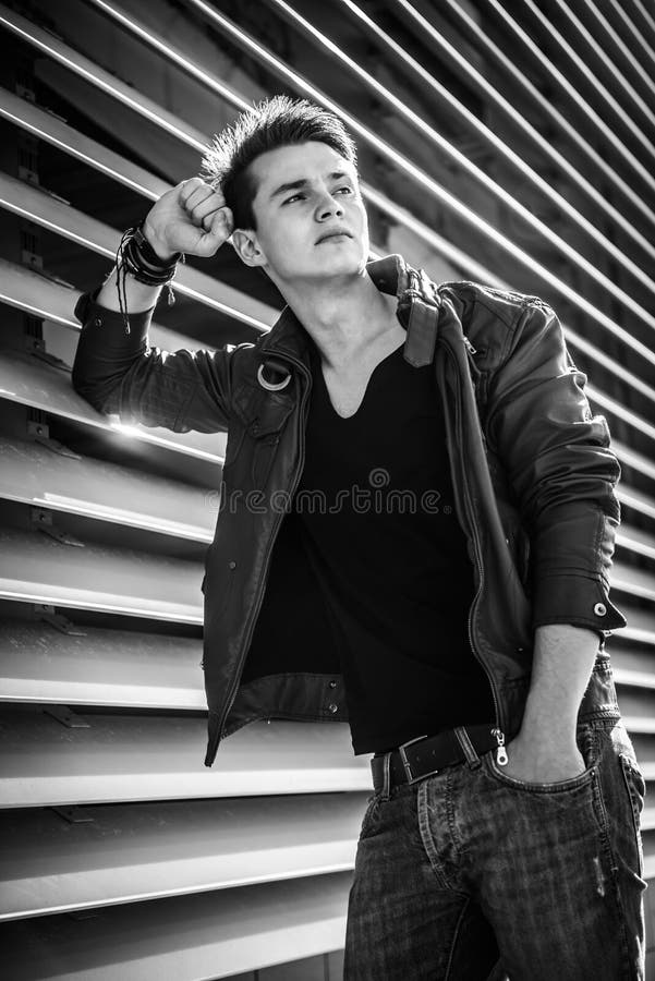 Young, Handsome Man in Front of the Wall Stock Image - Image of casual ...