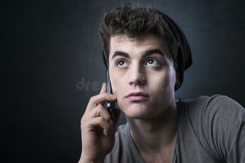 Young Handsome Man Having a Phone Call Stock Image - Image of ...