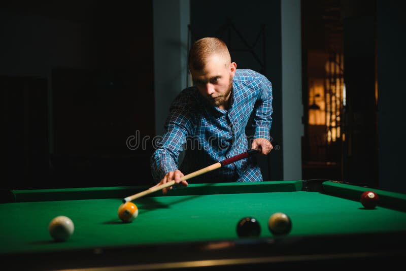 Young Handsome Man Leaning Over the Table while Playing Snooker Stock ...