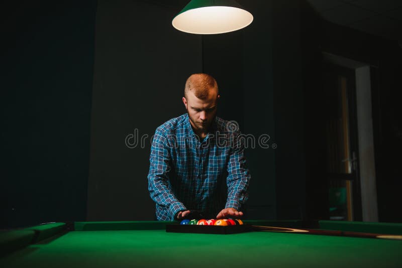 Young Handsome Man Leaning Over the Table while Playing Snooker Stock ...