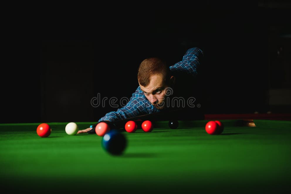 Young Handsome Man Leaning Over the Table while Playing Snooker Stock ...