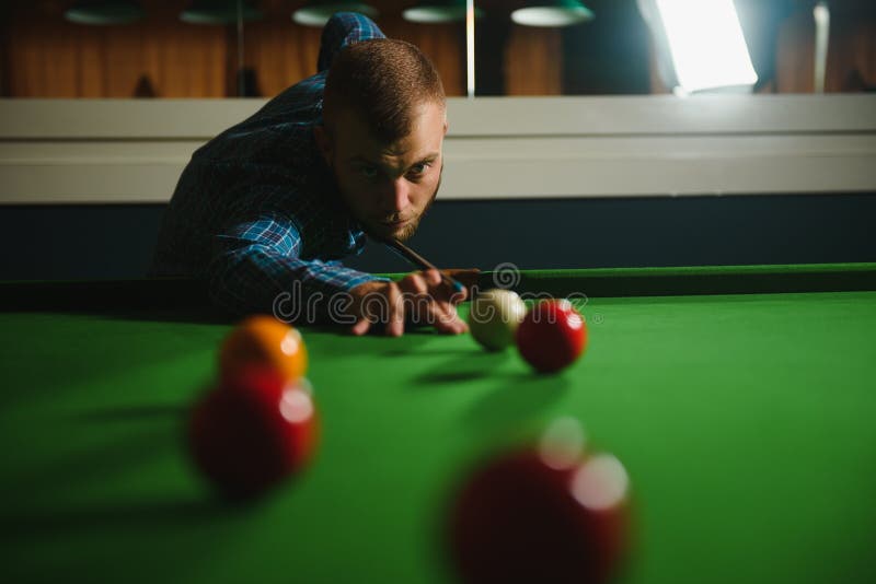 Young Handsome Man Leaning Over the Table while Playing Snooker Stock ...