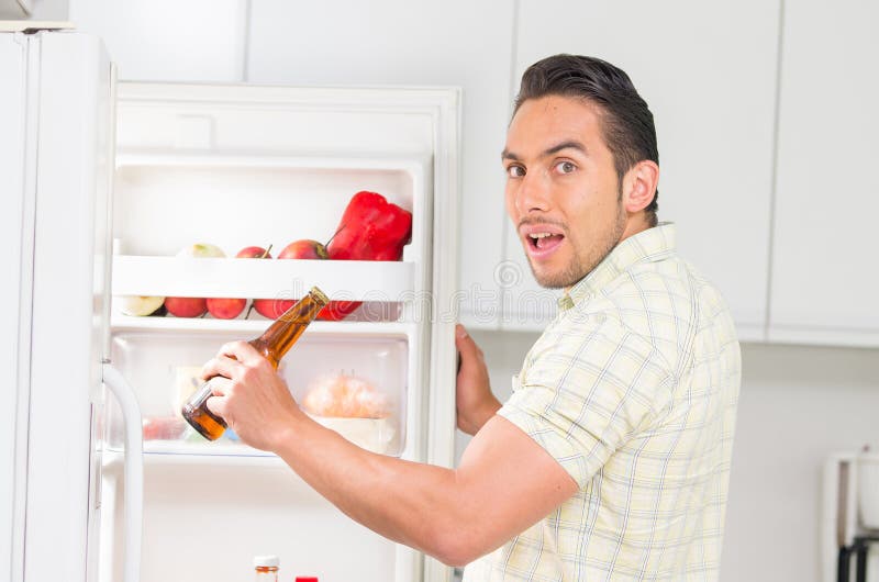 Young Handsome Man Looking for Food in the Fridge Stock Image - Image ...
