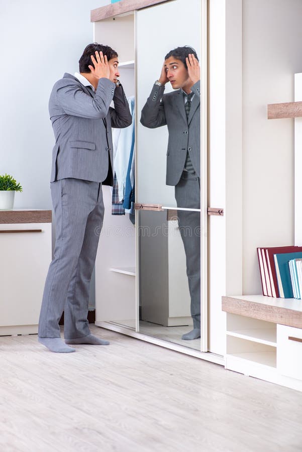 Young Handsome Man Looking at the Mirror Stock Photo - Image of manager ...