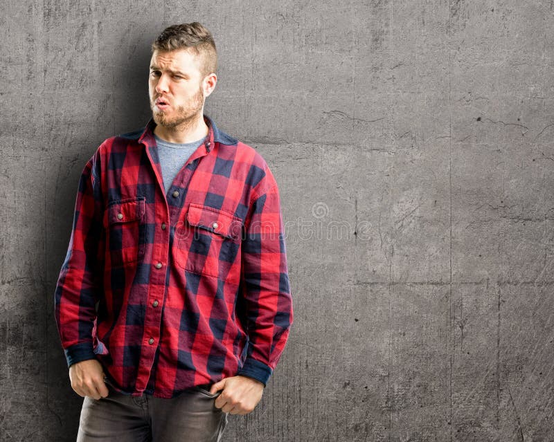 Young Handsome Man Over Wall Background Stock Photo - Image of shout ...