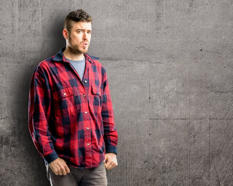 Young Handsome Man Isolated Over Wall Background Stock Photo - Image of ...