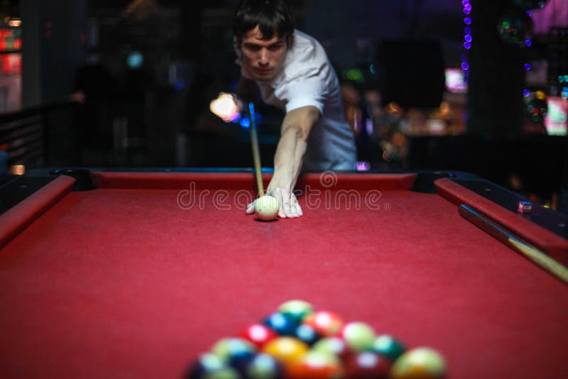 Young Handsome Man Playing in Pool at Night Bar Stock Photo - Image of ...
