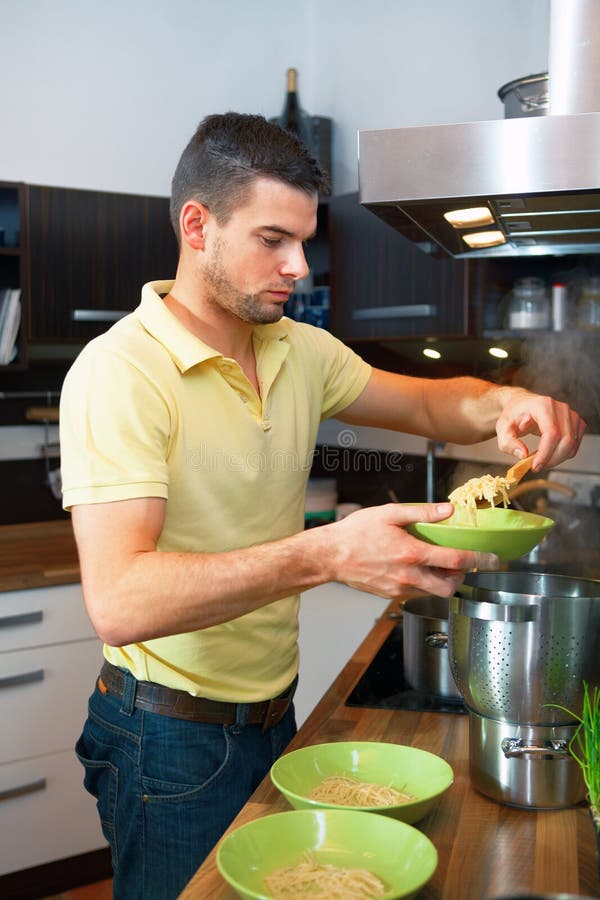Young Handsome Man Preparing Lunch Stock Photo - Image of caucasian ...