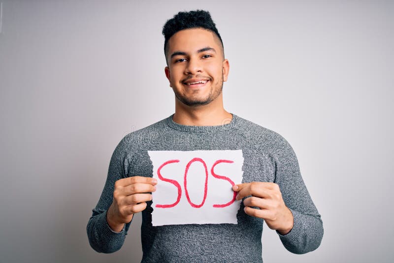 Young Handsome Man with Problem Holding Banner with Sos Message Over ...