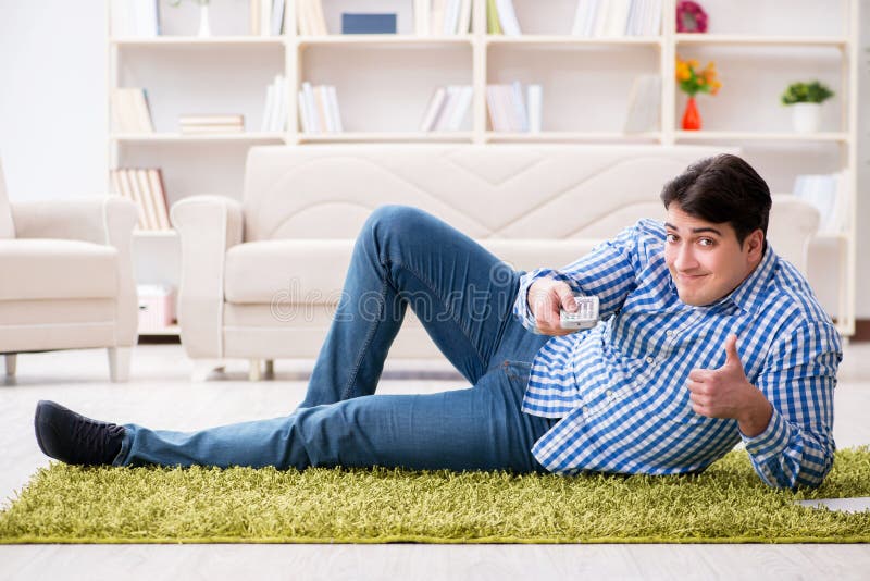 The Young Handsome Man Sitting on Floor at Home Stock Photo - Image of ...