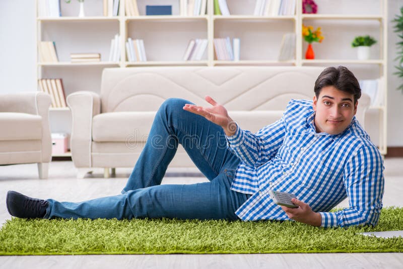 The Young Handsome Man Sitting on Floor at Home Stock Image - Image of ...