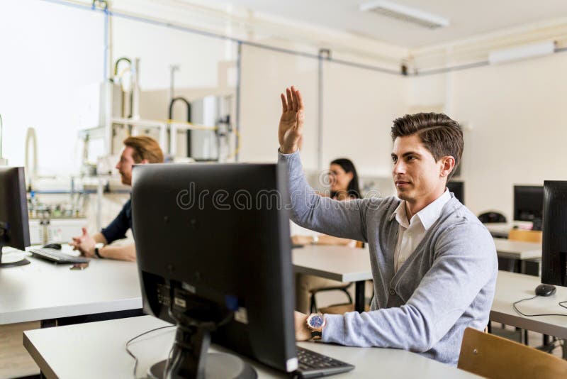 Young Handsome Man Sitting Front Computer Raising Hand Stock Photos ...