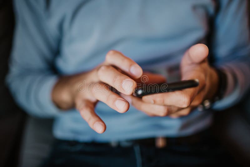Young Handsome Man Sitting at Home on Sofa and Using Mobile Phone. Men ...