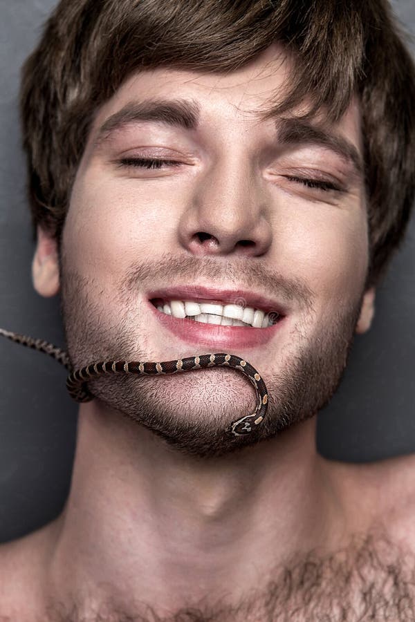 Young Handsome Man with Snake on His Face Stock Image - Image of cool ...