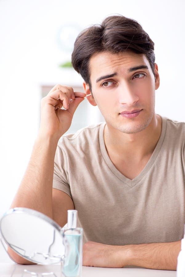 The Young Handsome Man Staring in the Mirror Stock Image - Image of ...