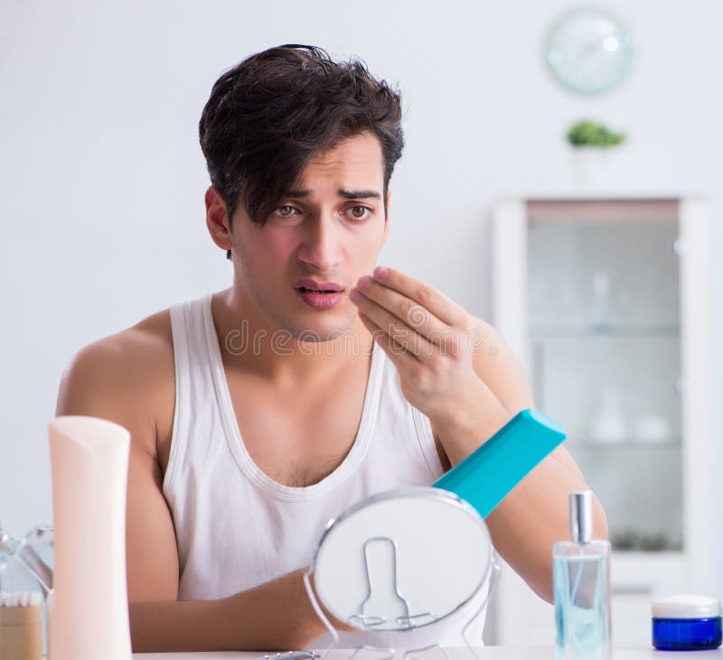 Young Handsome Man Staring in the Mirror Stock Photo - Image of ...