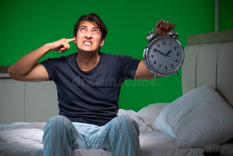 The Young Handsome Man Suffering from Insomnia at Home Stock Image ...