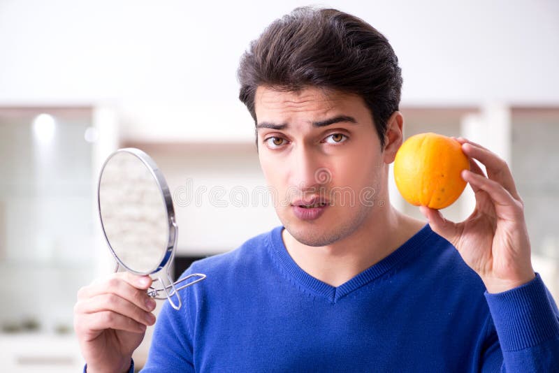 The Young Handsome Man Taking Care of Face Skin Stock Photo - Image of ...