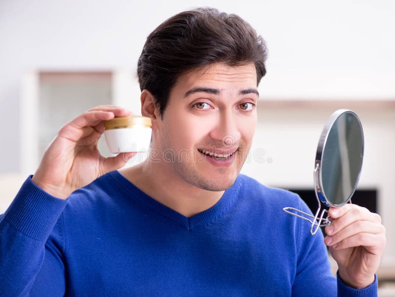 Young Handsome Man Taking Care of Face Skin Stock Photo - Image of ...