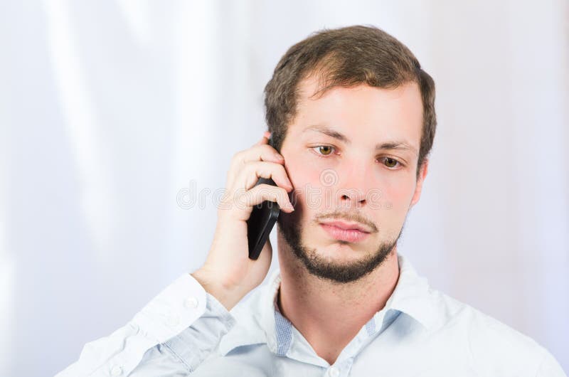 Young Handsome Man Using Cell Phone Stock Image - Image of people ...