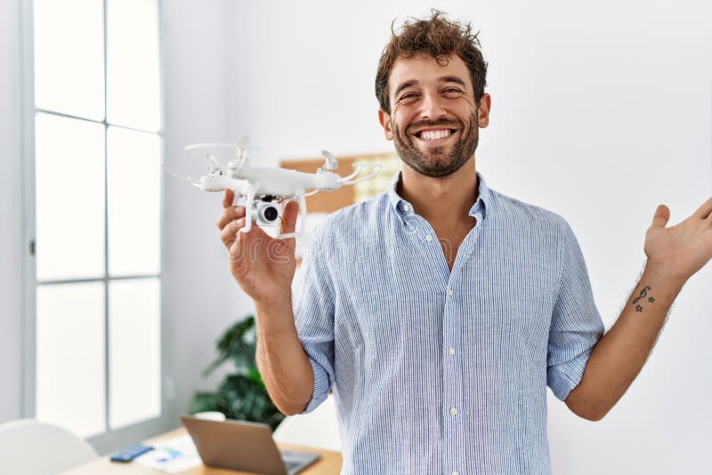 Young Handsome Man Using Drone at Architect Office Celebrating ...