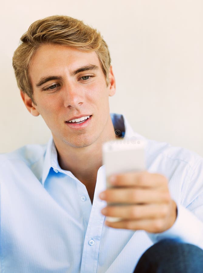 Young Handsome Man Using Smart Mobile Phone, Stock Photo - Image of ...