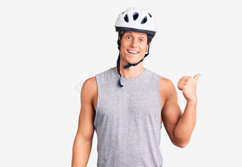 Young Handsome Man Wearing Bike Helmet Smiling With Happy Face Looking