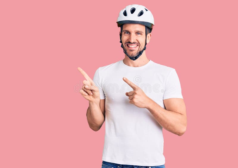 Young Handsome Man Wearing Bike Helmet Smiling And Looking At The