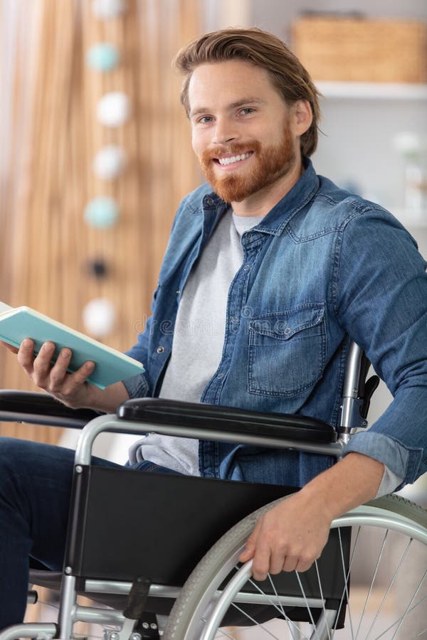Young Handsome Man on Wheelchair in Disability Concept Stock Photo ...