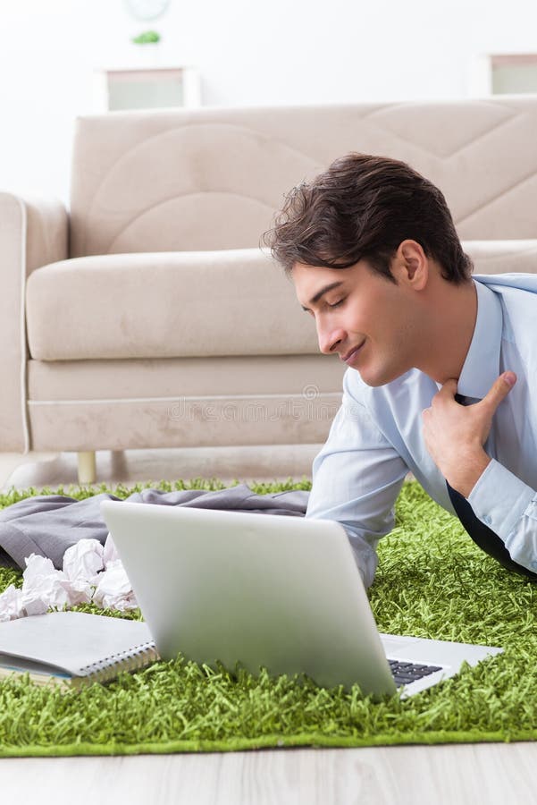 The Young Handsome Man Working Under Startup Project at Home Stock ...