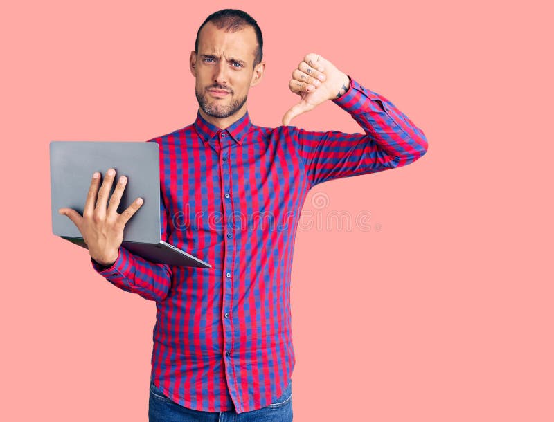 Young Handsome Man Working Using Computer Laptop with Angry Face ...