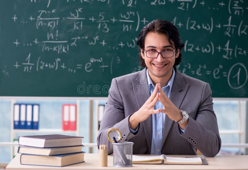 Young Handsome Math Teacher in Classroom Stock Photo - Image of lesson ...