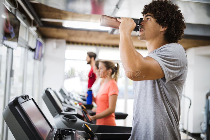 Young Handsome Man Doing Cardio Training in Gym Stock Image - Image of ...
