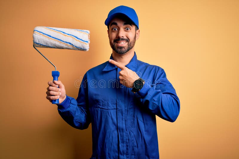 Young Handsome Painter Man with Beard Wearing Blue Uniform and Cap ...