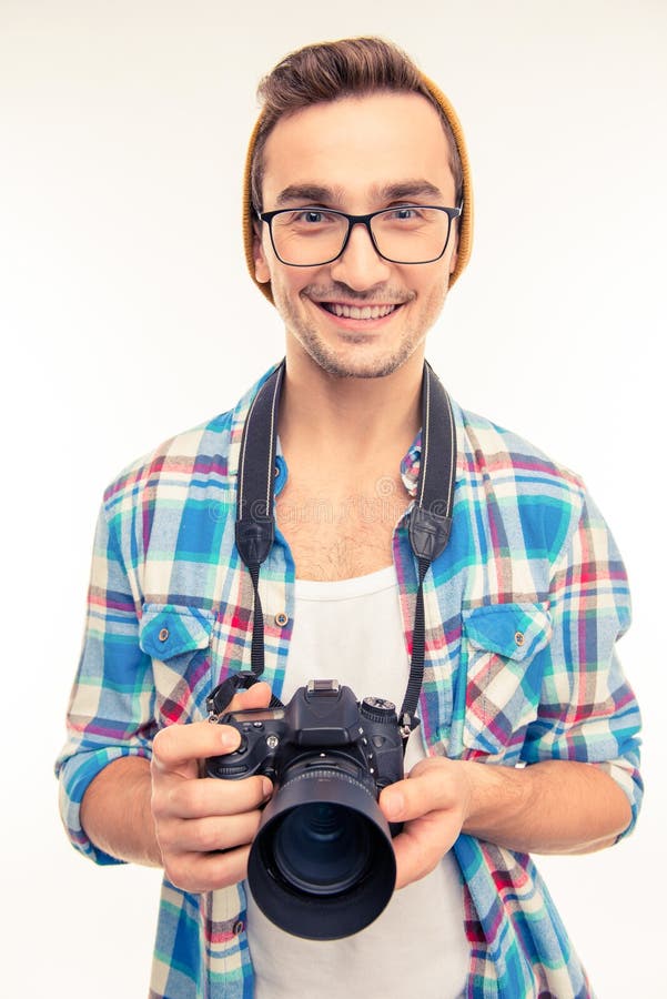 Young Handsome Photographer Taking a Photo Stock Image - Image of ...