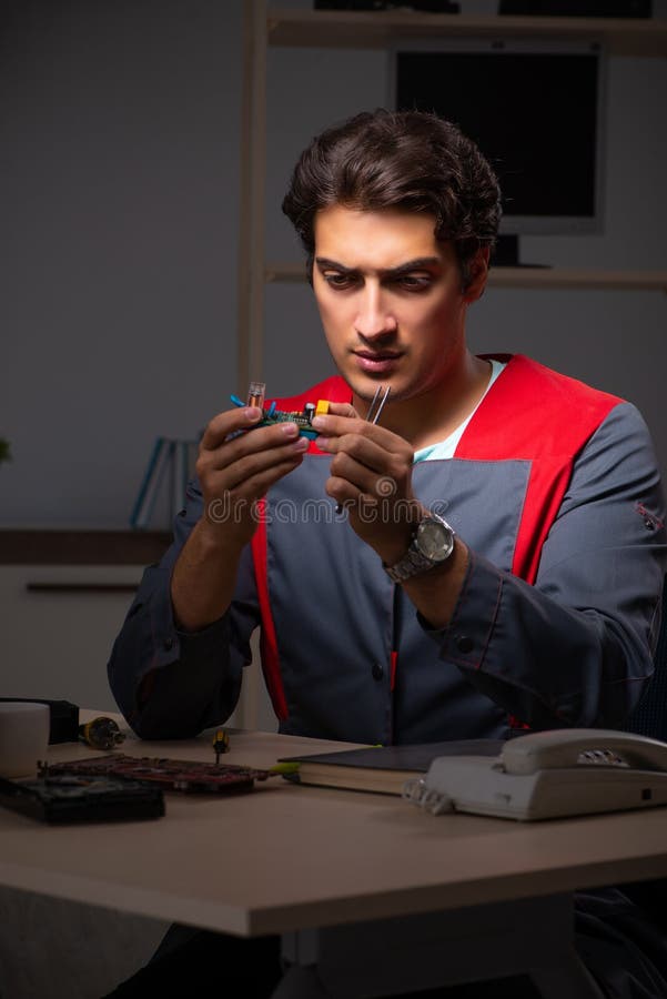 The Young Handsome Repairman Repairing Computer Stock Photo - Image of ...