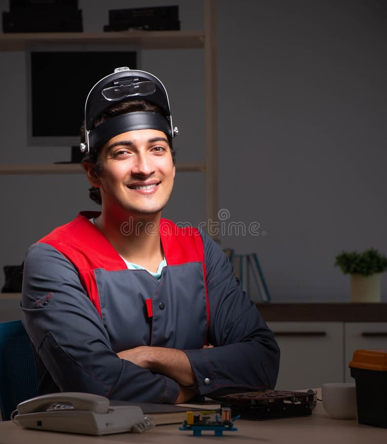 Handsome Repairman. Man Repairman Builder Work Clothes. Plan Repair ...