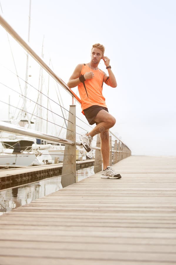 Young Handsome Courier Guy Making Delivery of Parcel Stock Photo ...