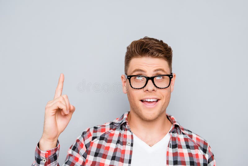 Young Handsome Smiling Genious in Glasses Having an Idea Stock Image ...