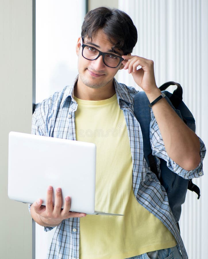 Young Handsome Student Standing at the Window Stock Image - Image of ...