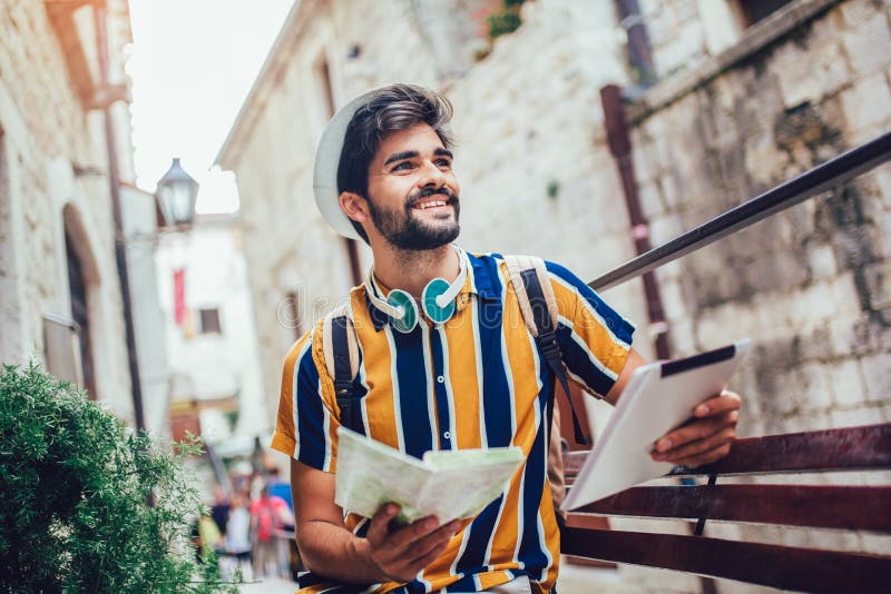 Handsome Tourist Men Using Digital Tablet in a City Stock Image - Image ...
