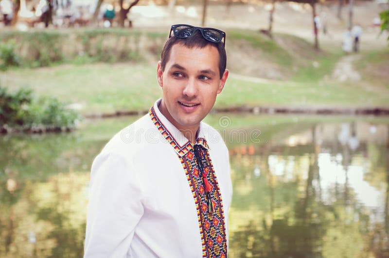 Handsome Ukrainian Man Holding Horizontal White A4 Paper Poster. Copy ...