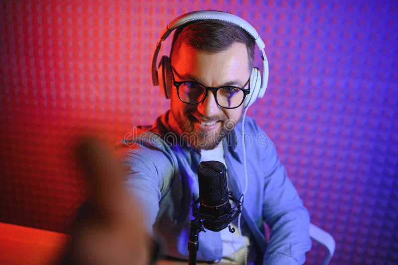 Young Handsome Vlogger Having Live Stream. Stock Photo - Image of ...