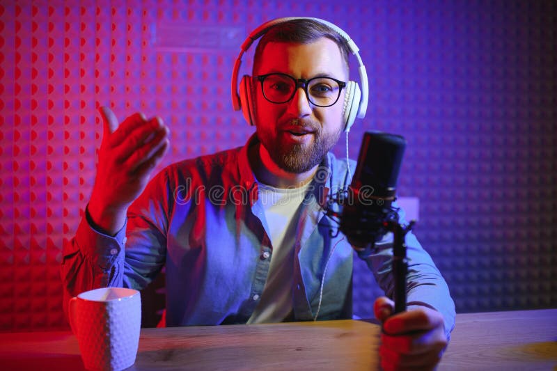 Young Handsome Vlogger Having Live Stream. Stock Photo - Image of ...