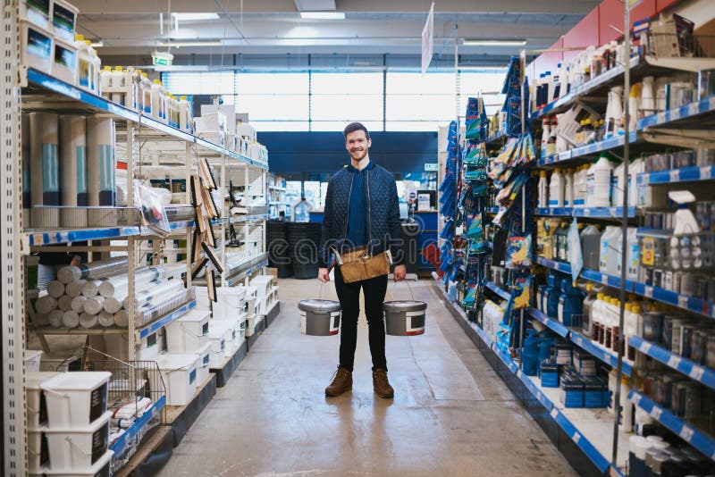 Young Handyman Posing in a Hardware Store Stock Photo - Image of ...