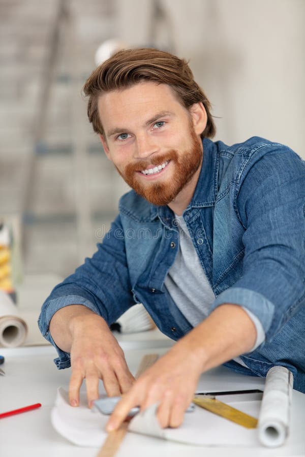 Young Handyman Worker Renovating Interior Stock Photo - Image of people ...
