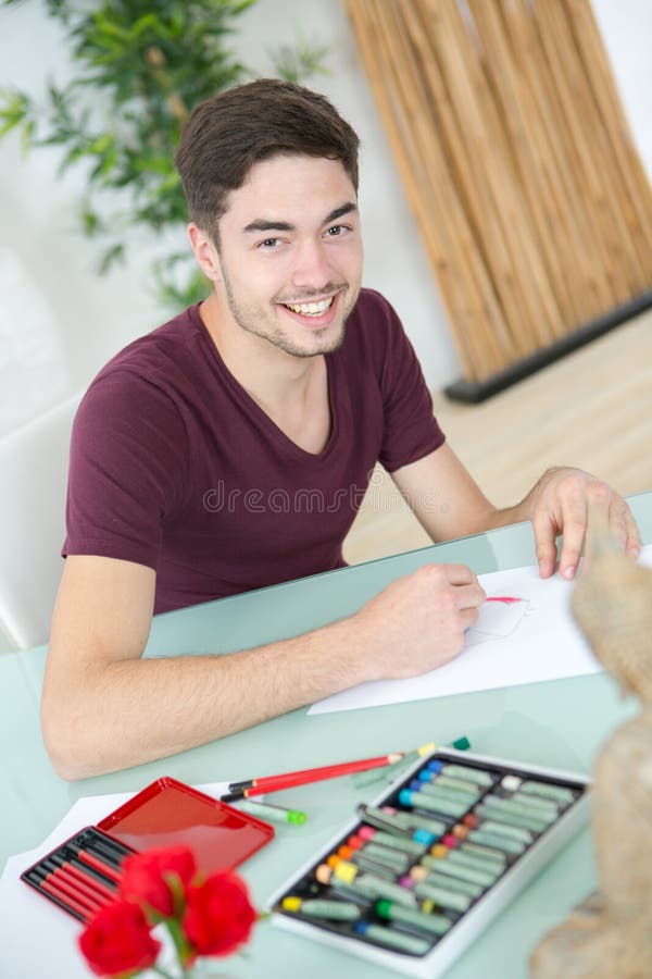 Young Happy Artist Drawing Something at Home Stock Photo - Image of ...